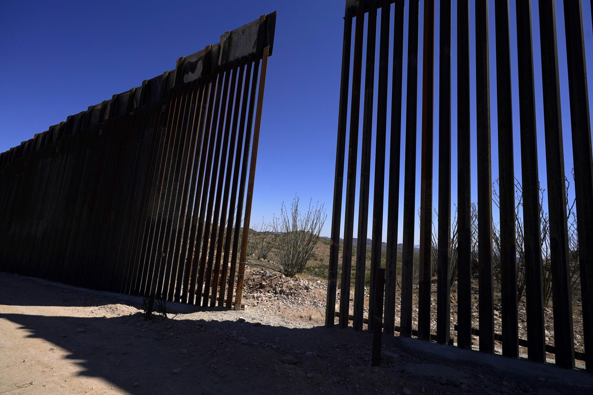 As Congress moves to have stored border wall panels installed, Biden ...