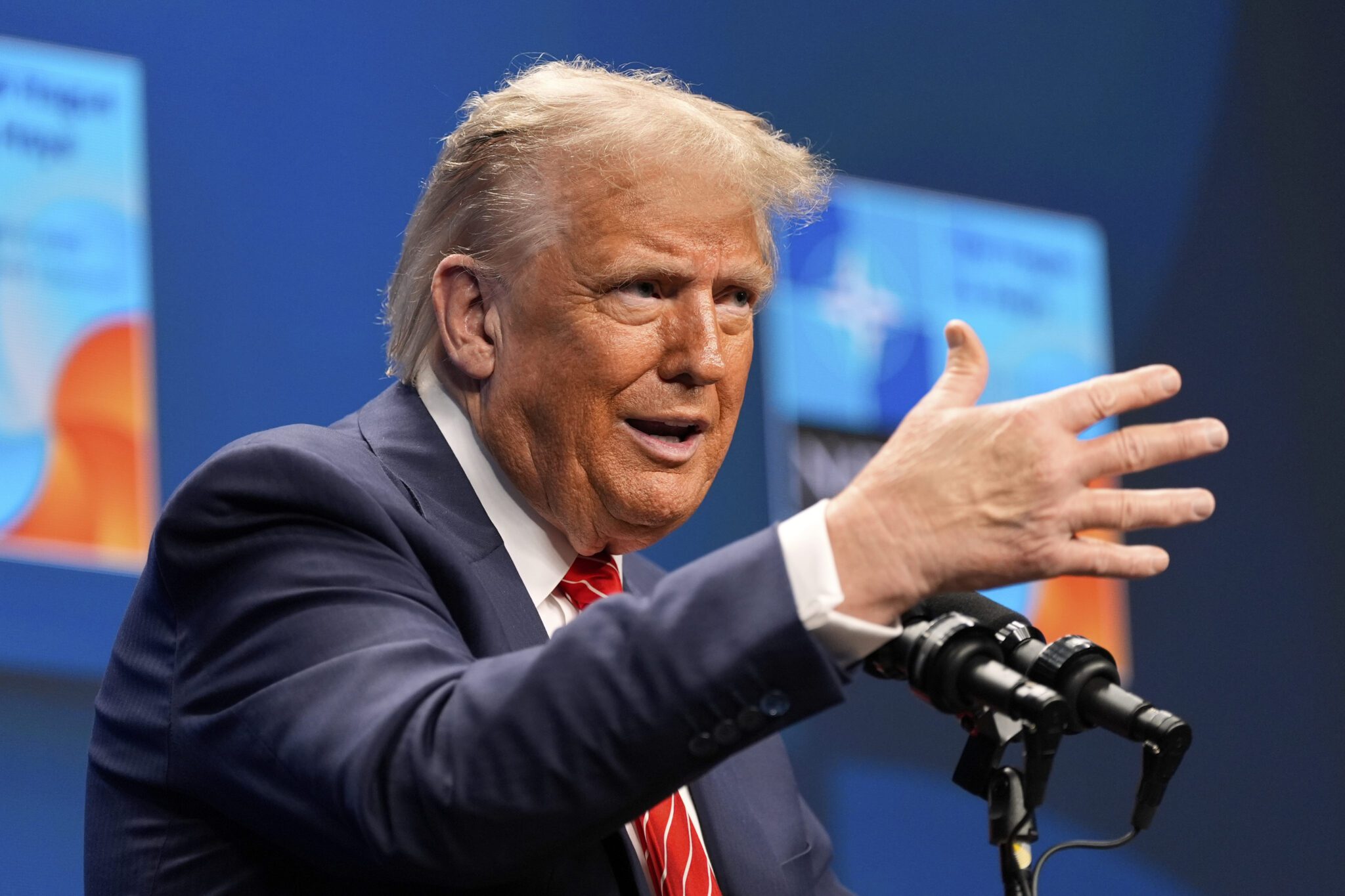 NATO leaders agree to hike military spending and restate 'ironclad ...